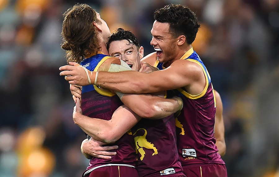 Neale Down to Lachie's Impressive 100 Games